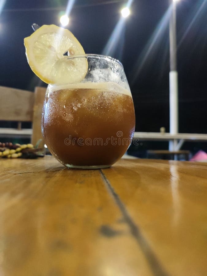 Lemon Tea in a Beautiful Glass Plus Fresh Lemon Slices is Served Cold ...