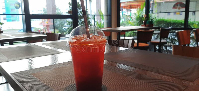 Lemon Tea in Plastic Cup on the Table Stock Photo - Image of drink ...
