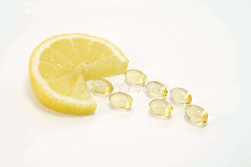 Lemon with vitamin c pills stock image. Image of nature - 41642425