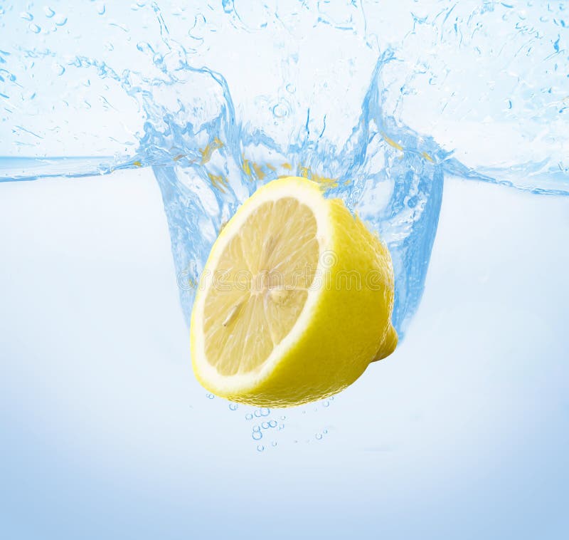 Lemon Slices Falling Under Water with Splash Stock Photo - Image of ...