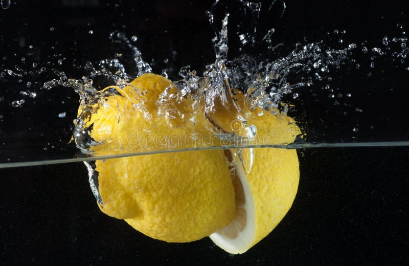 Lemon in water stock image. Image of lemon, blocks, dropped - 6228837