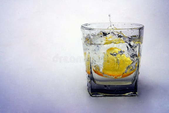 Lemon in water stock image. Image of fruit, bubble, fall - 2492347