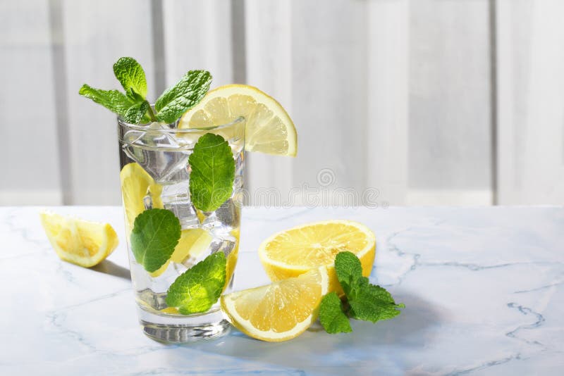 Lemon Water with Fresh Lemons Stock Photo - Image of homemade, liquid ...