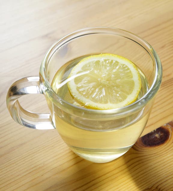 Lemon Water in Glass Mug stock photo. Image of refreshing - 10934412