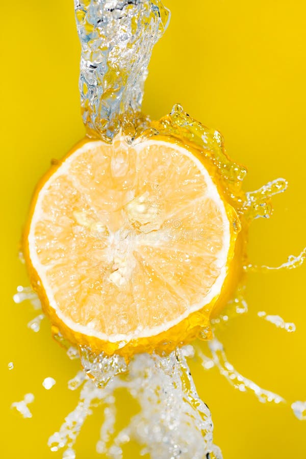 Lemon in water stock photo. Image of flow, bright, food - 89687572