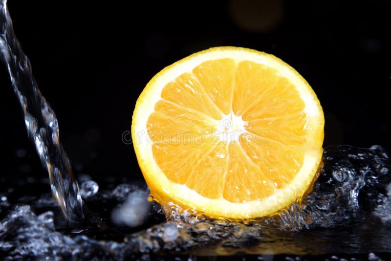 Lemon in the water splash stock photo. Image of tasty - 210889286