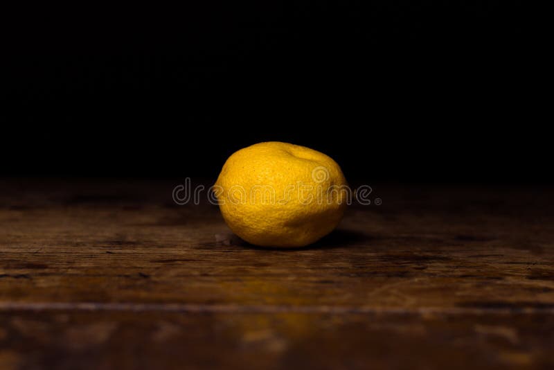 Lemon on wooden surface stock image. Image of natural - 32991473