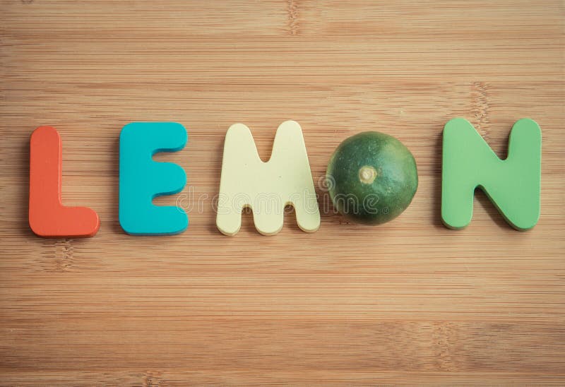 Lemon Wooden Word on Black Board Stock Photo - Image of closeup ...