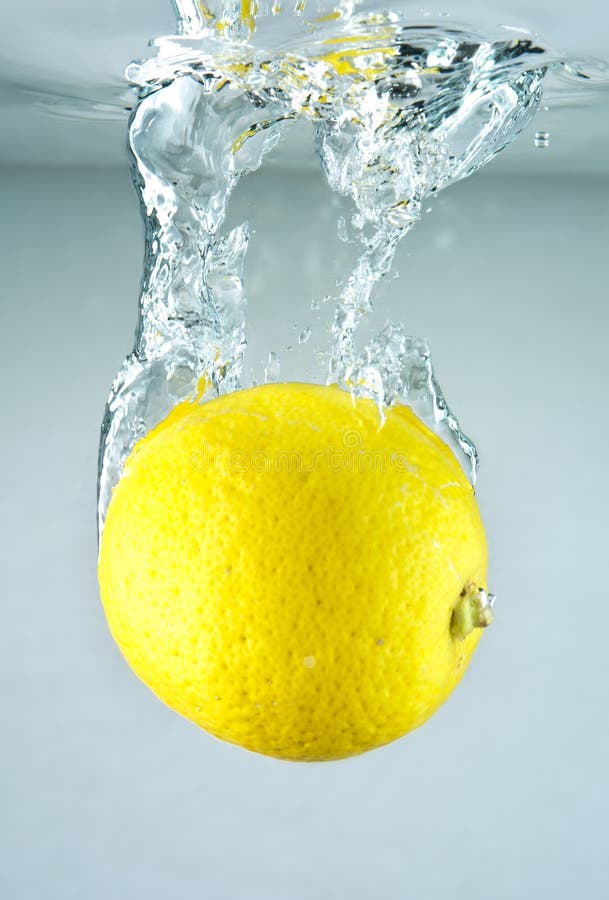 Lemon Dropping in Martini Glass Stock Photo - Image of wild, lemon: 280460