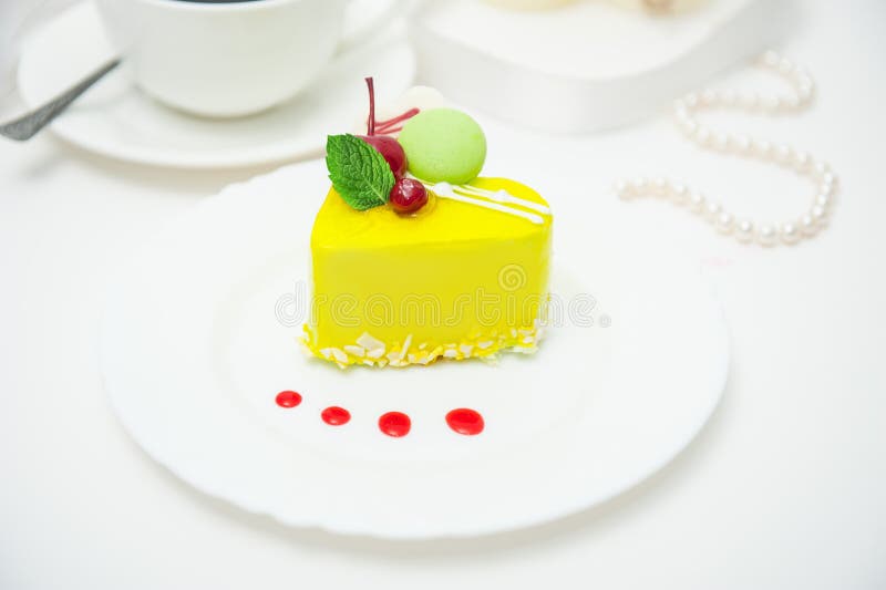 Lemon Yellow Heart Cake with Cherries and Cream on White Background ...
