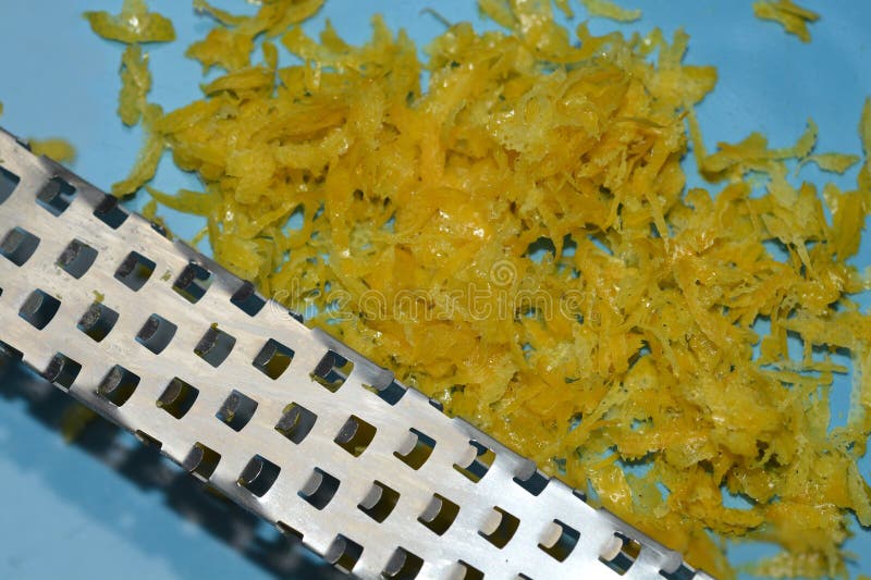 Lemon zest stock image. Image of grated, spoonful, food - 323285857