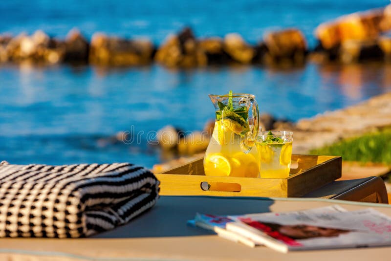 Lemonade on the beach stock photo. Image of orange, healthy - 166984560
