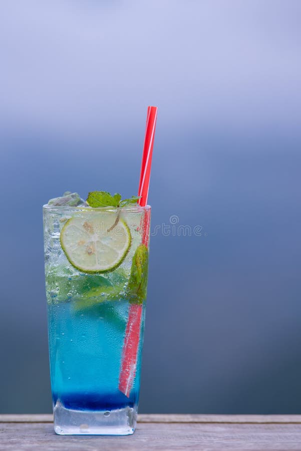 Lemonade on Blue Background Stock Photo - Image of leaf, backdrop ...