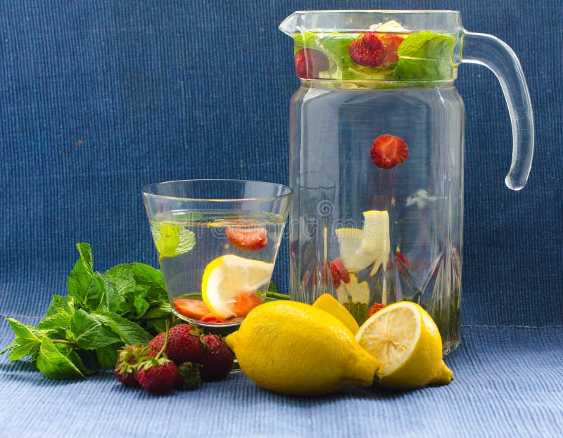 Lemonade on Blue Background Stock Photo - Image of vitamins, lemonade ...