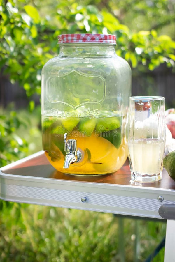 Lemonade Dispenser on a Hot Sunny Day Stock Image - Image of glass ...