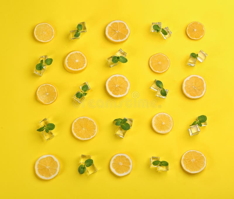 Lemonade Layout with Juicy Lemon Slices, Ice and Mint on Yellow ...