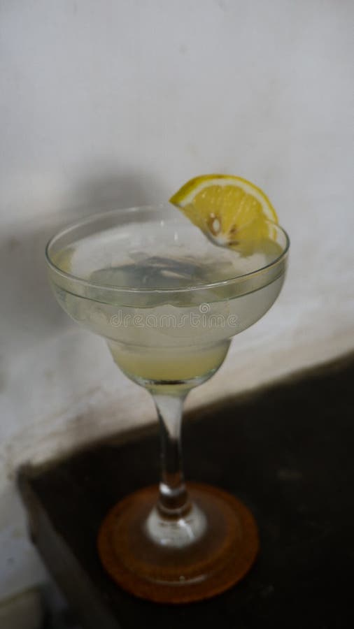 Lemonade. Refreshing Sparkling Drink in an Elegant Glass Garnished with ...