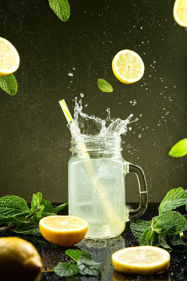 Lemonade Splash in Drinking Glass Stock Image - Image of liquid, glass ...