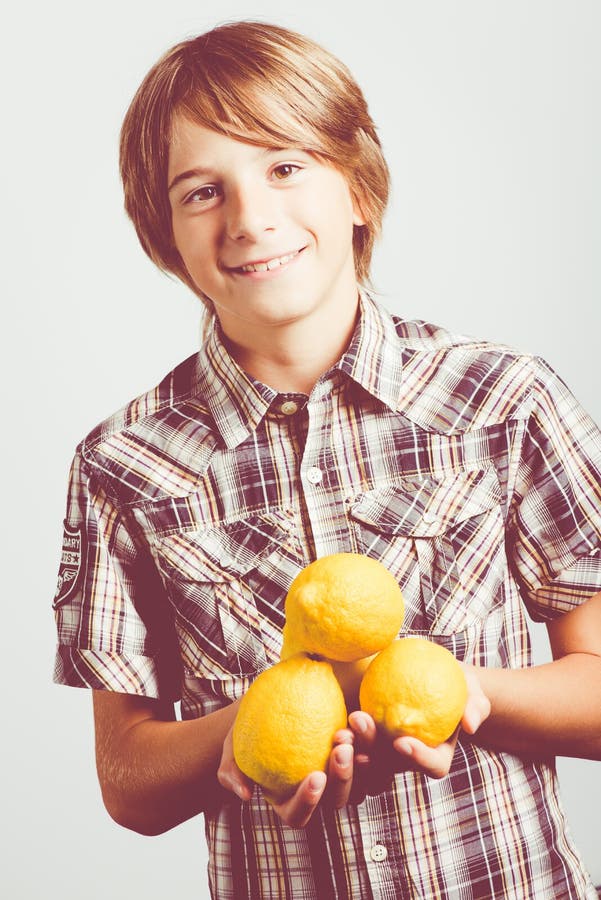 Lemons child stock photo. Image of child, carbohydrates - 44384798