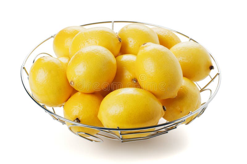 Lemons in chrome basket stock image. Image of citrus - 16592397