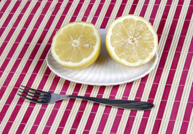 Lemons and fork stock image. Image of isolated, fruit - 6994145