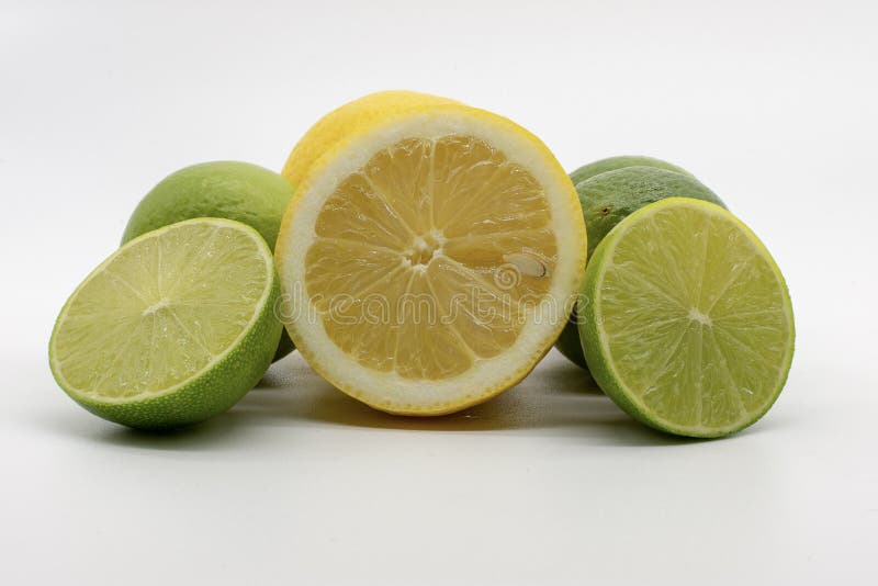A Hand Full of Lemons and Limes Stock Photo - Image of citrus, green ...