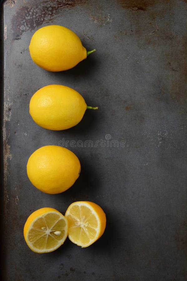 Lemons on Metal Baking Sheet Stock Photo - Image of pulp, metal: 48444416