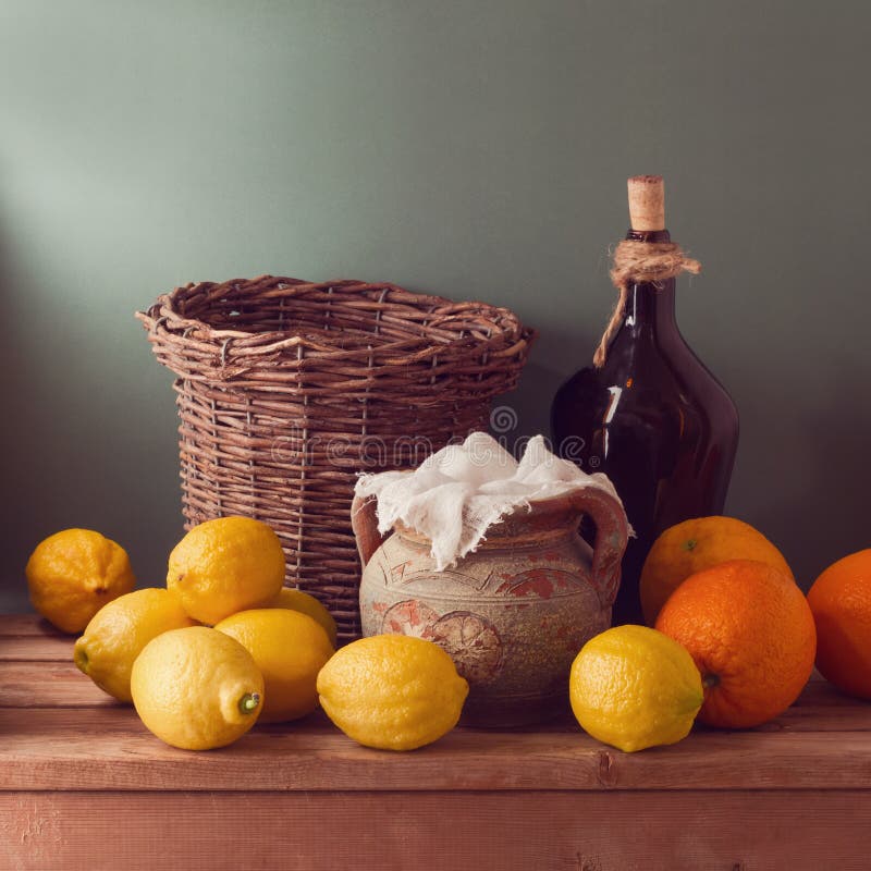 Lemons and Oranges on Wooden Table. Vintage Still Life Composition ...