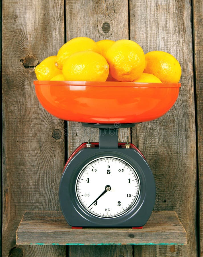 Lemons on scales stock photo. Image of juice, ripe, lemon - 44809286