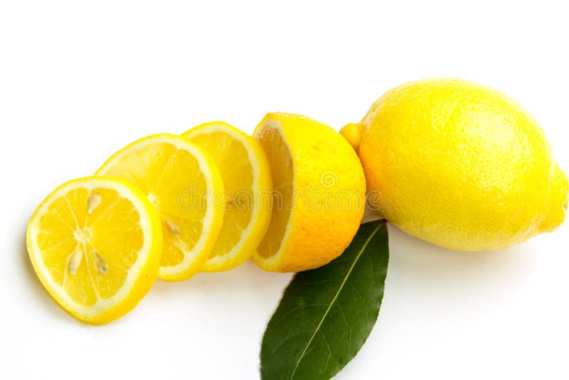 Lemons Sliced in Half and Slices Stock Photo - Image of sliced ...