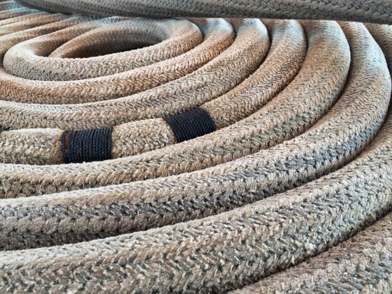 Close up of coil of rope stock photo. Image of vessel - 237867562