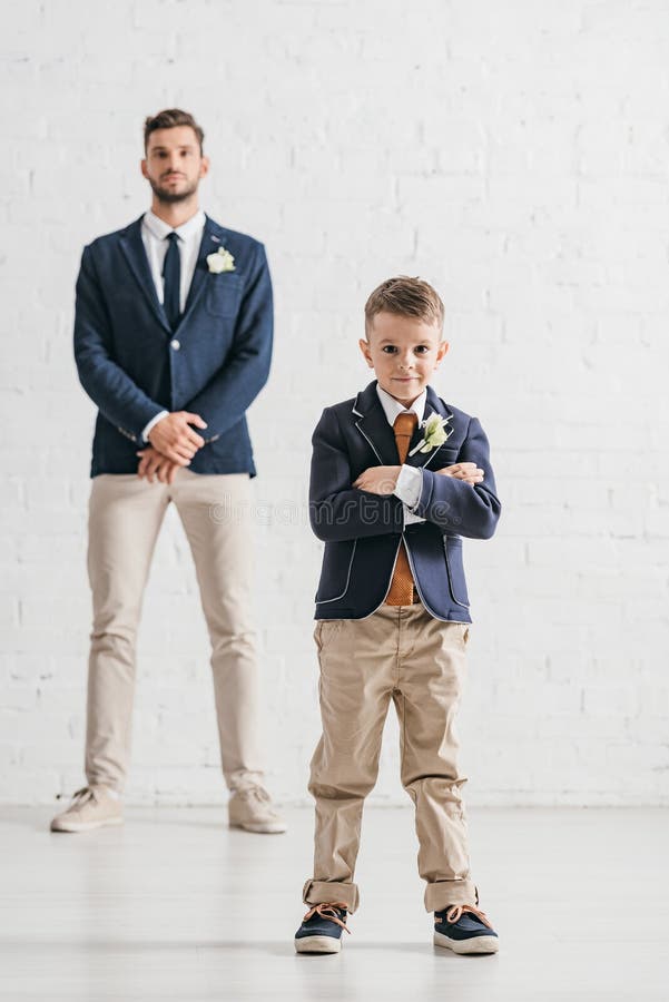 Length View of Father and Son in Jackets with Boutonnieres Stock Image ...