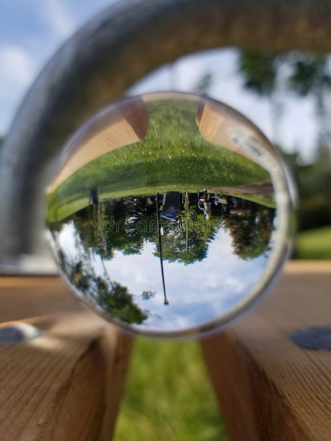 Lens Ball on Bench stock photo. Image of lens, glasses - 250367022
