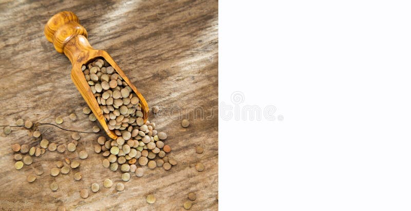 Lens Culinaris - Raw Lentils in the Wooden Spoon Stock Photo - Image of ...