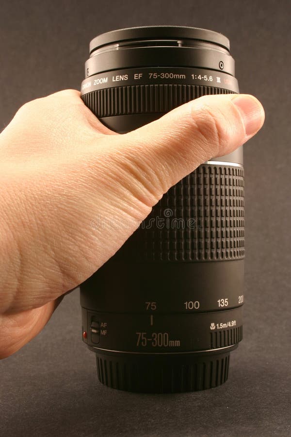 Lens hold by hand stock image. Image of optical, focus, handup - 74561