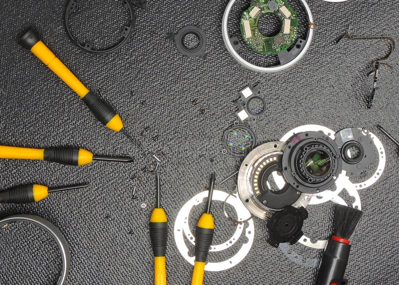 Lens Repair with Yellow Screwdriver, Repair Concept Stock Image - Image ...