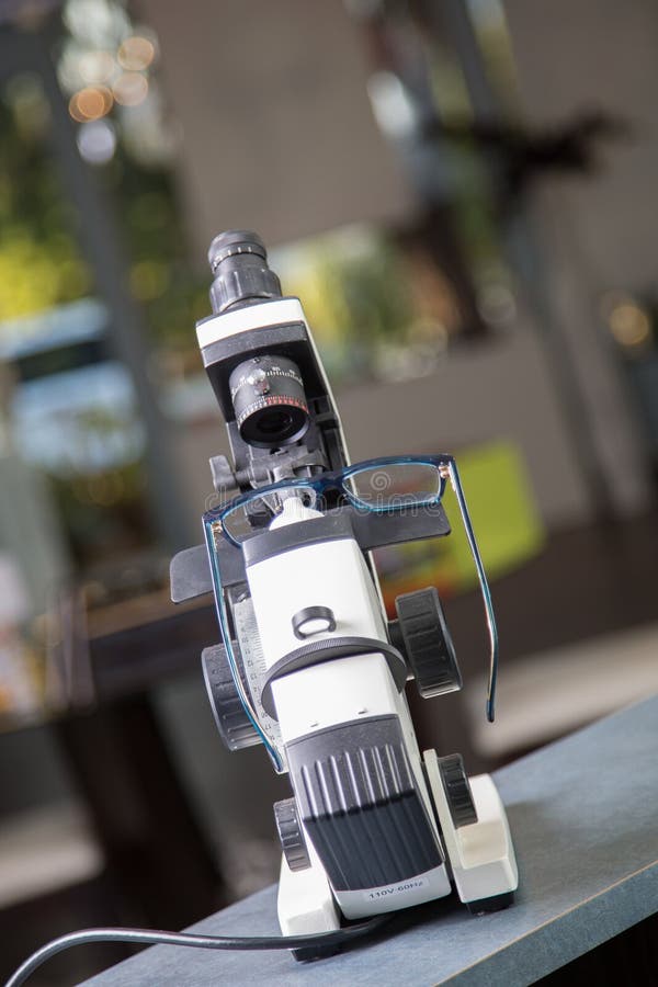 Lensometer with eyeglasses stock image. Image of lensometer - 29291511