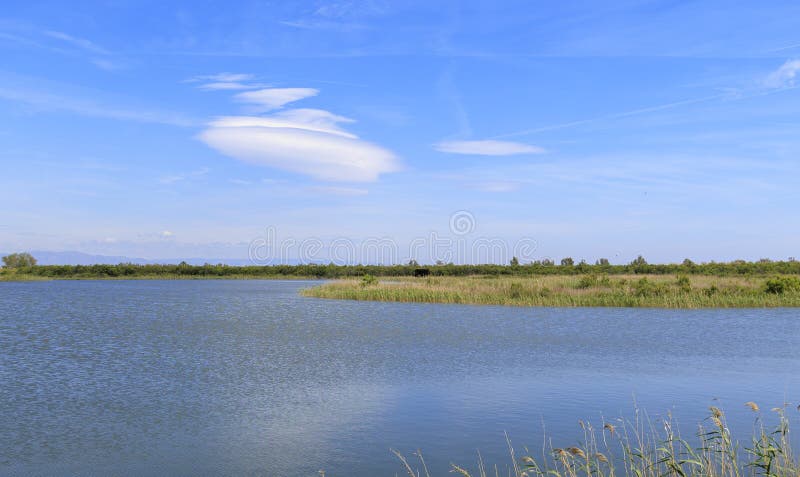 Windy Day and Cloud Formations in the Lagoon. Stock Image - Image of ...