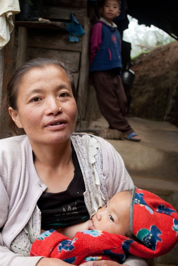 Lepcha Woman with baby editorial photography. Image of hold - 38009977