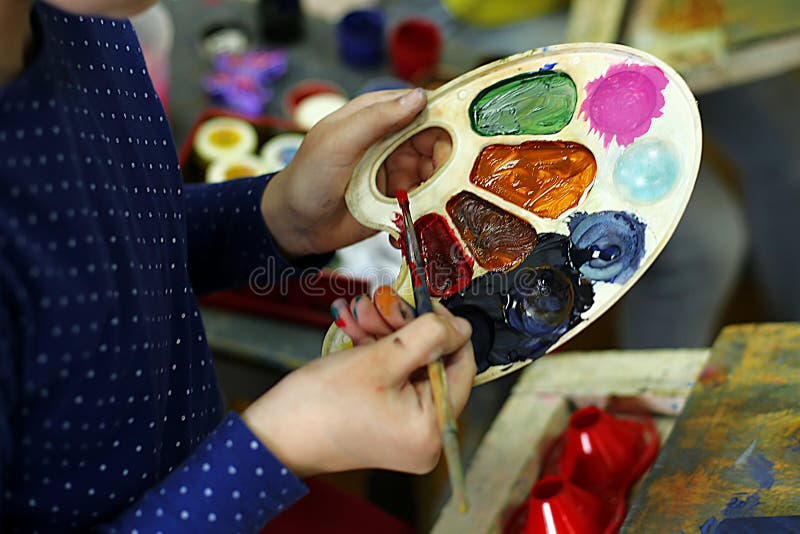 A Lesson in an Art School for Children on Paint, Modeling and ...