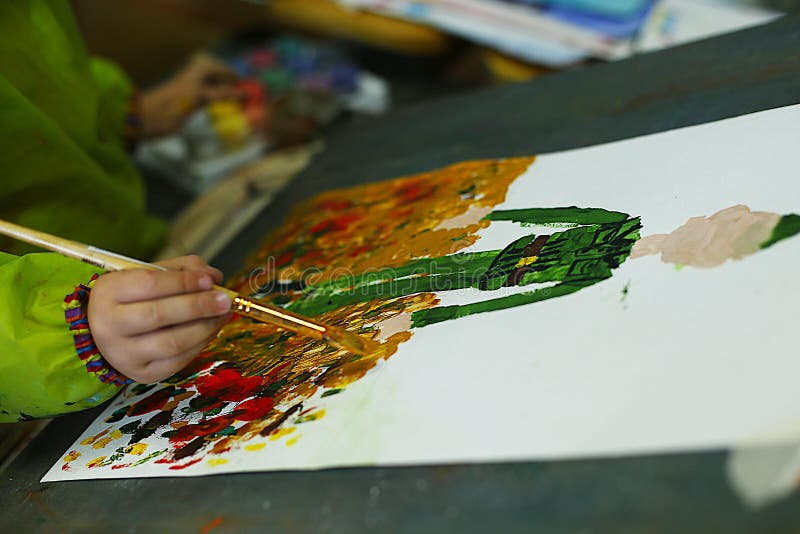 A Lesson in an Art School for Children on Paint, Modeling and ...