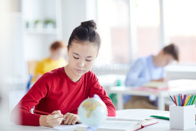 Lesson of individual work stock photo. Image of pupil - 136541850