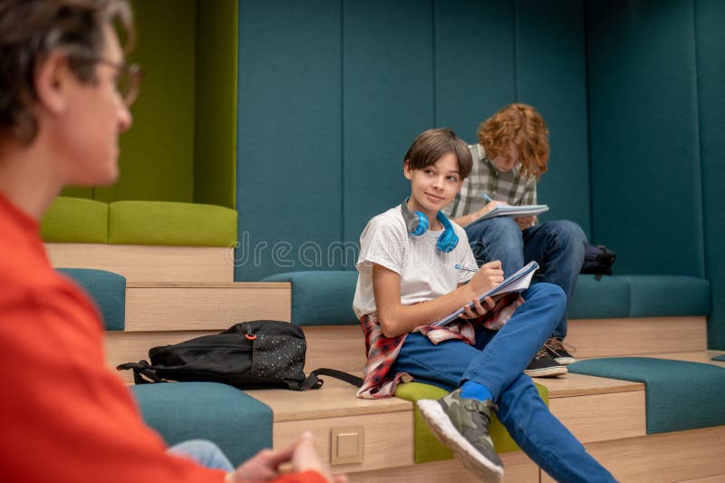 A Teacher and the Students Having at the Lesson Stock Image - Image of ...