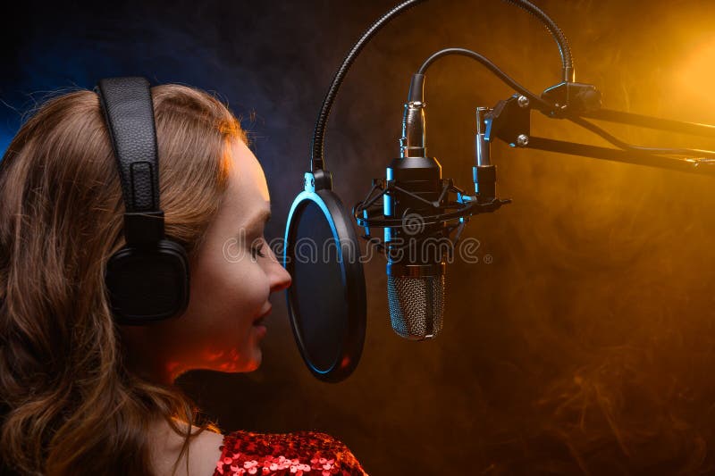 Microphone and Bright Rays of Light on Stage before the Concert Begins ...