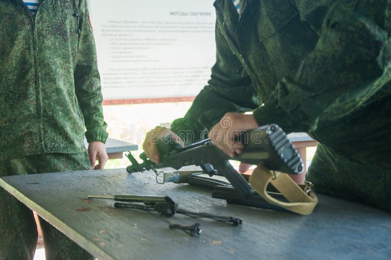Military Camp. Assembling an Automatic Gun Stock Image - Image of ...