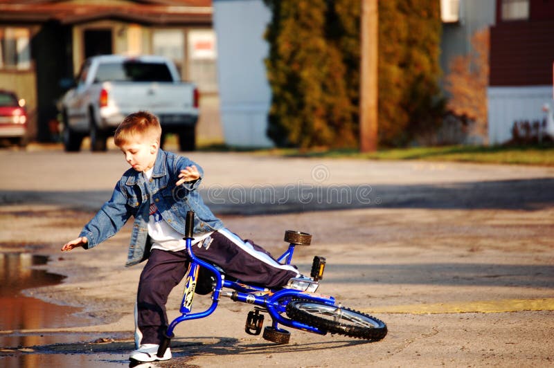 Child Falling Off Bike Stock Photos - Free & Royalty-Free Stock Photos ...