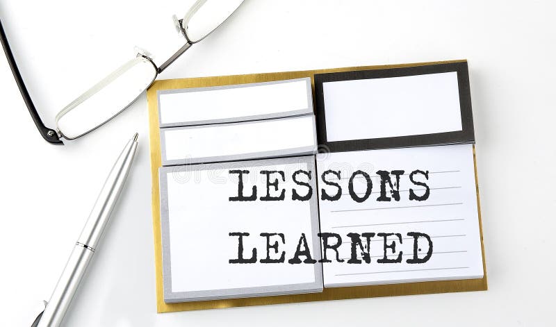 LESSONS LEARNED Text on the Sticky Notes with Glasses and Pen, Business ... LESSONS LEARNED Text on the Sticky Notes with Glasses and Pen, Business ...