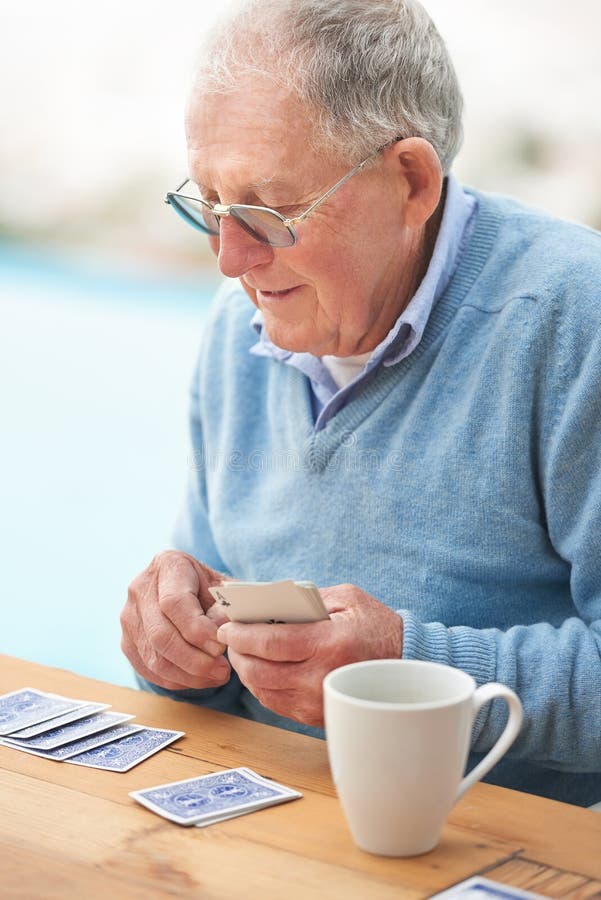 Let the Games Begin. a Senior Man Holding a Deck of Cards. Stock Photo ...