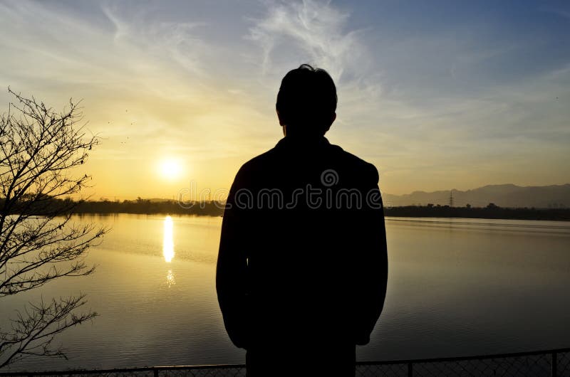 Sculpture Thinking Man in Sunset Silhouette. Concept Photo Stock Photo ...