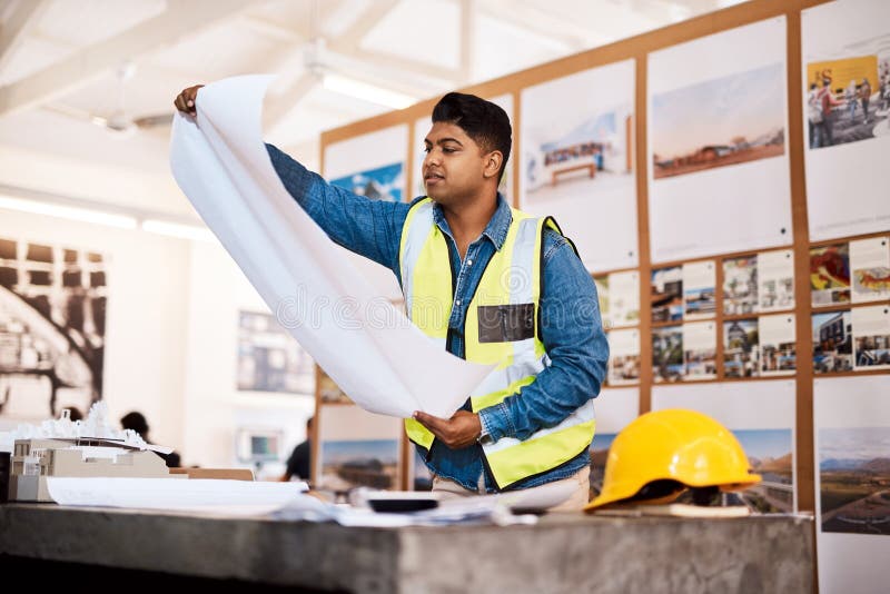 Let Me Put Your Vision on Paper. a Young Architect Looking at a ...